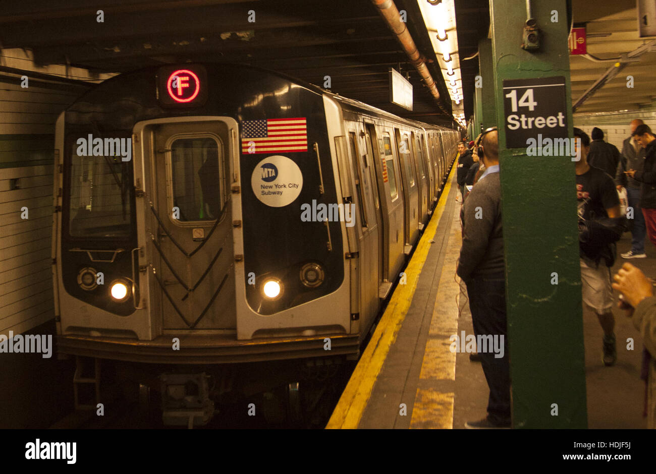 14th Street subway station platform along the F line in Manhattan Stock ...