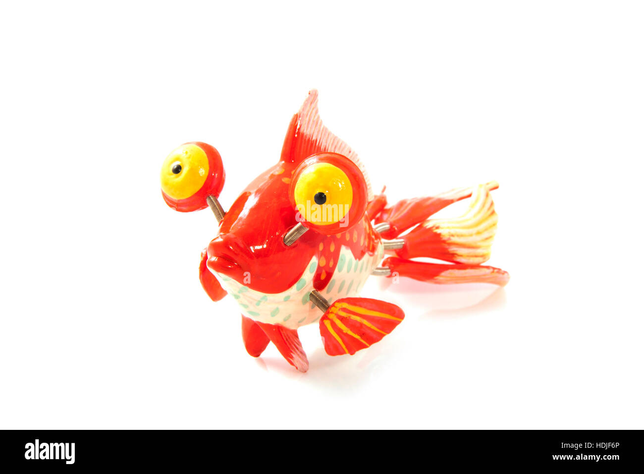 Hand made wooden goldfish isolated over white Stock Photo - Alamy