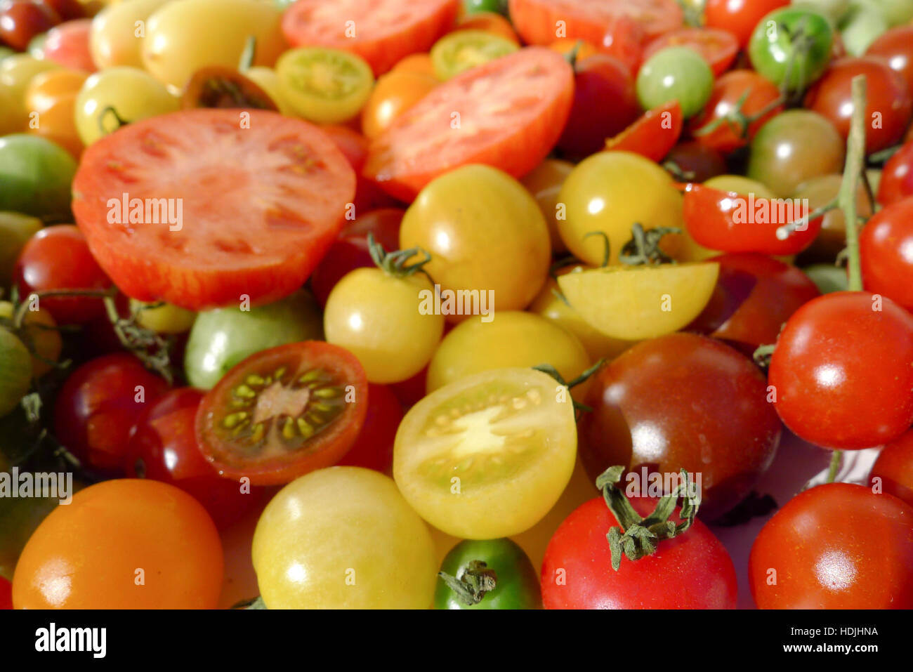 Variety of fresh vegetables colored tomatoes, red, yellow and green ...