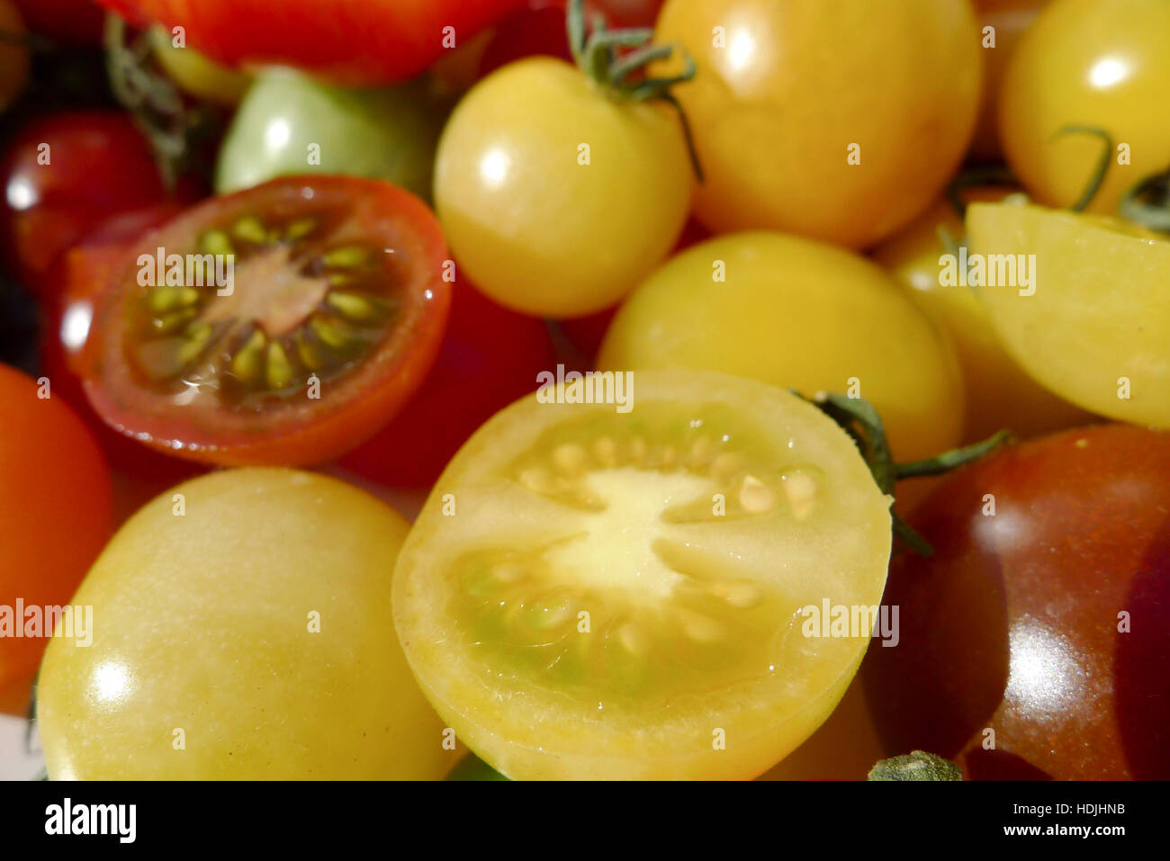 Variety of fresh vegetables colored tomatoes, red, yellow and green ...