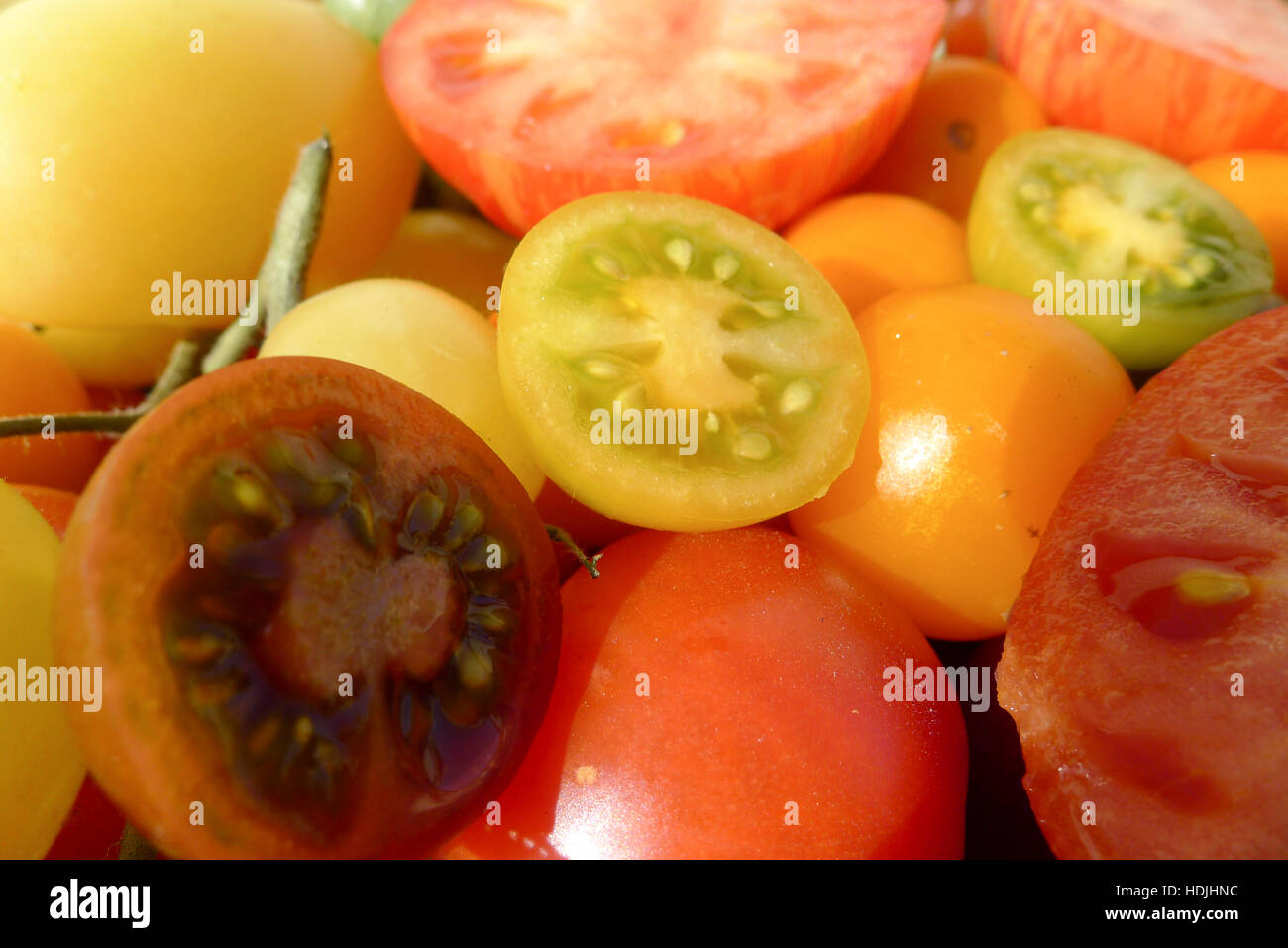 Variety of fresh vegetables colored tomatoes, red, yellow and green ...