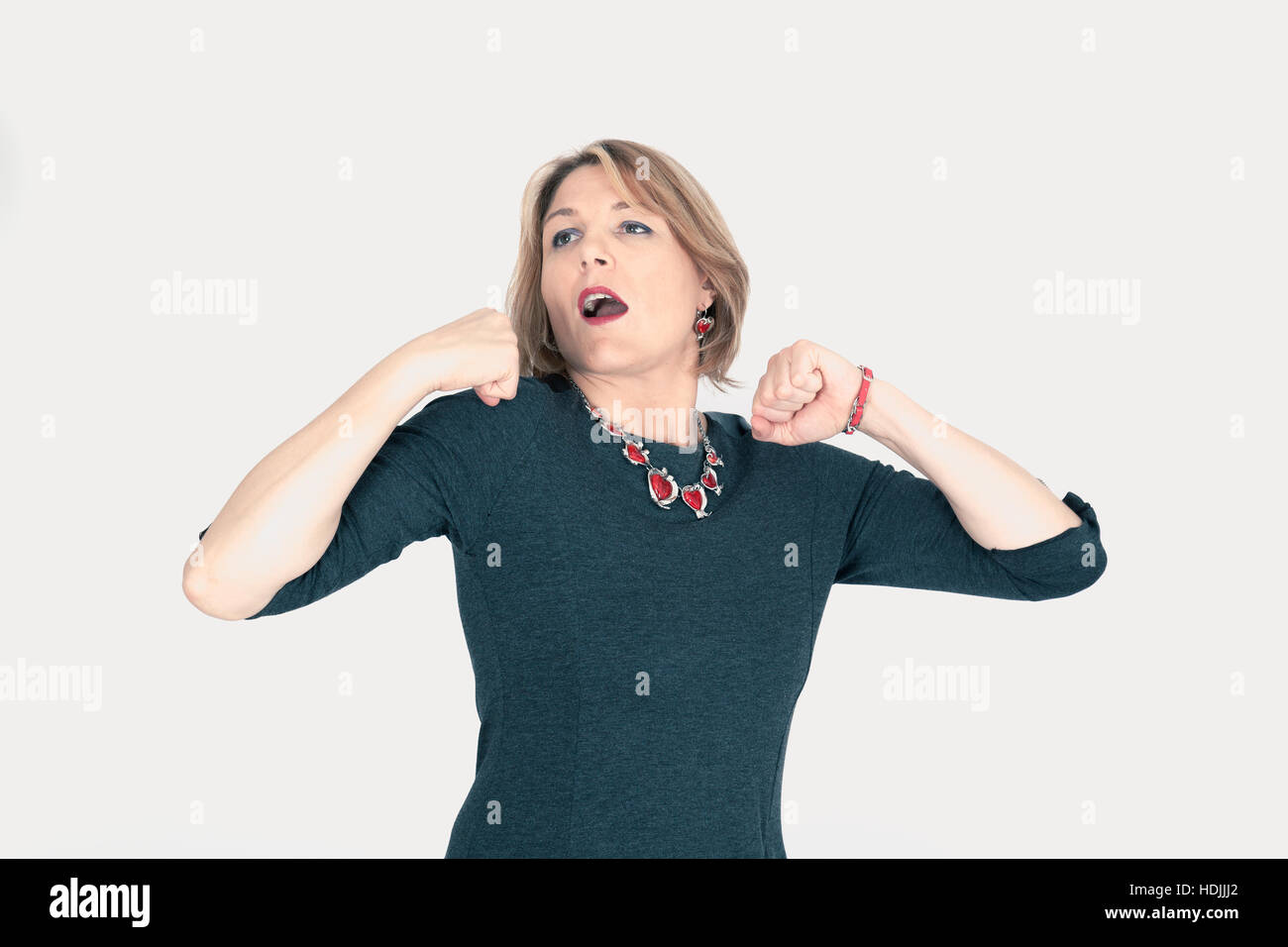 Beautiful woman doing different expressions in different sets of ...