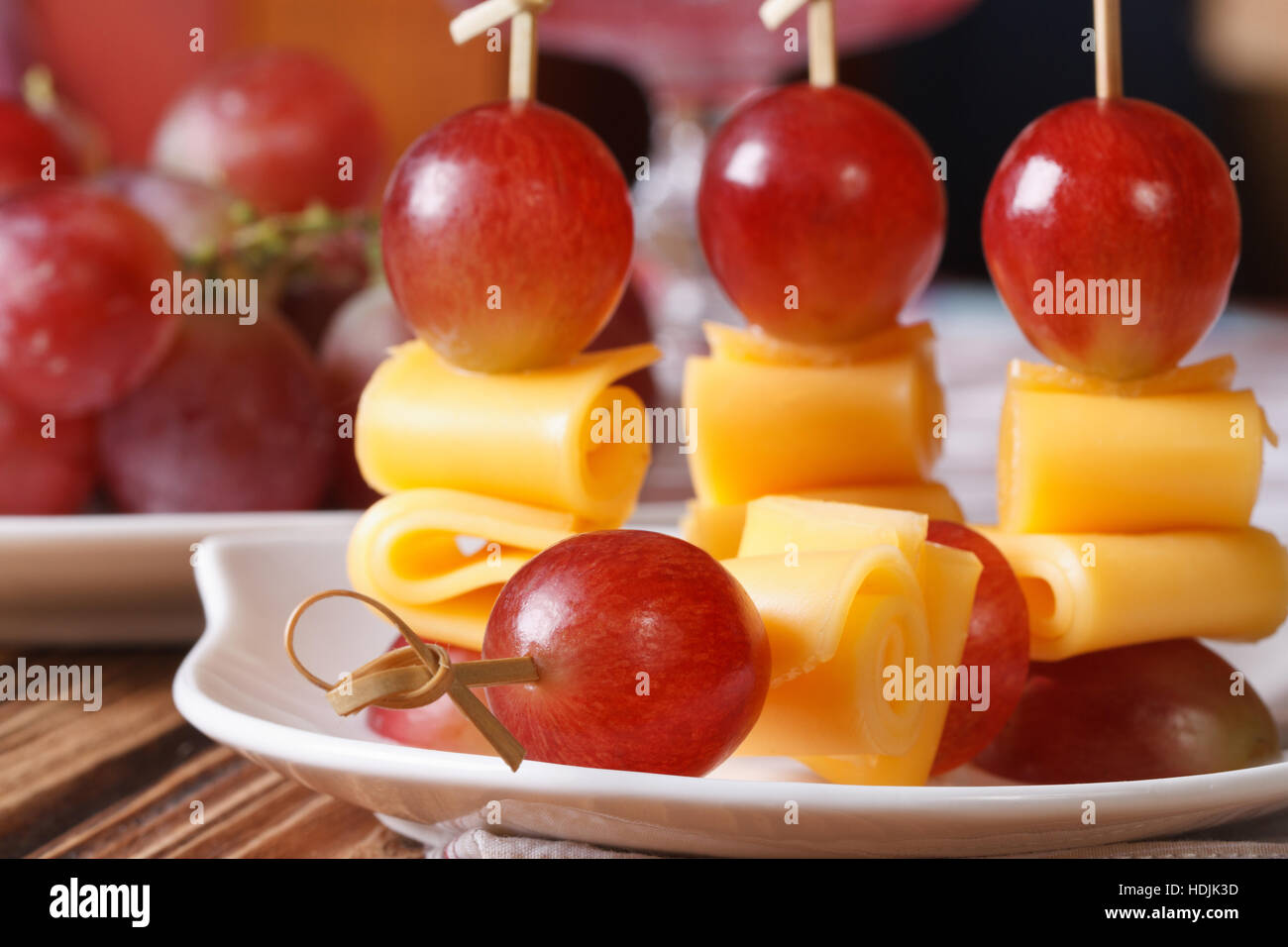 Fingerfood: grapes and cheese on skewers macro horizontal Stock Photo ...