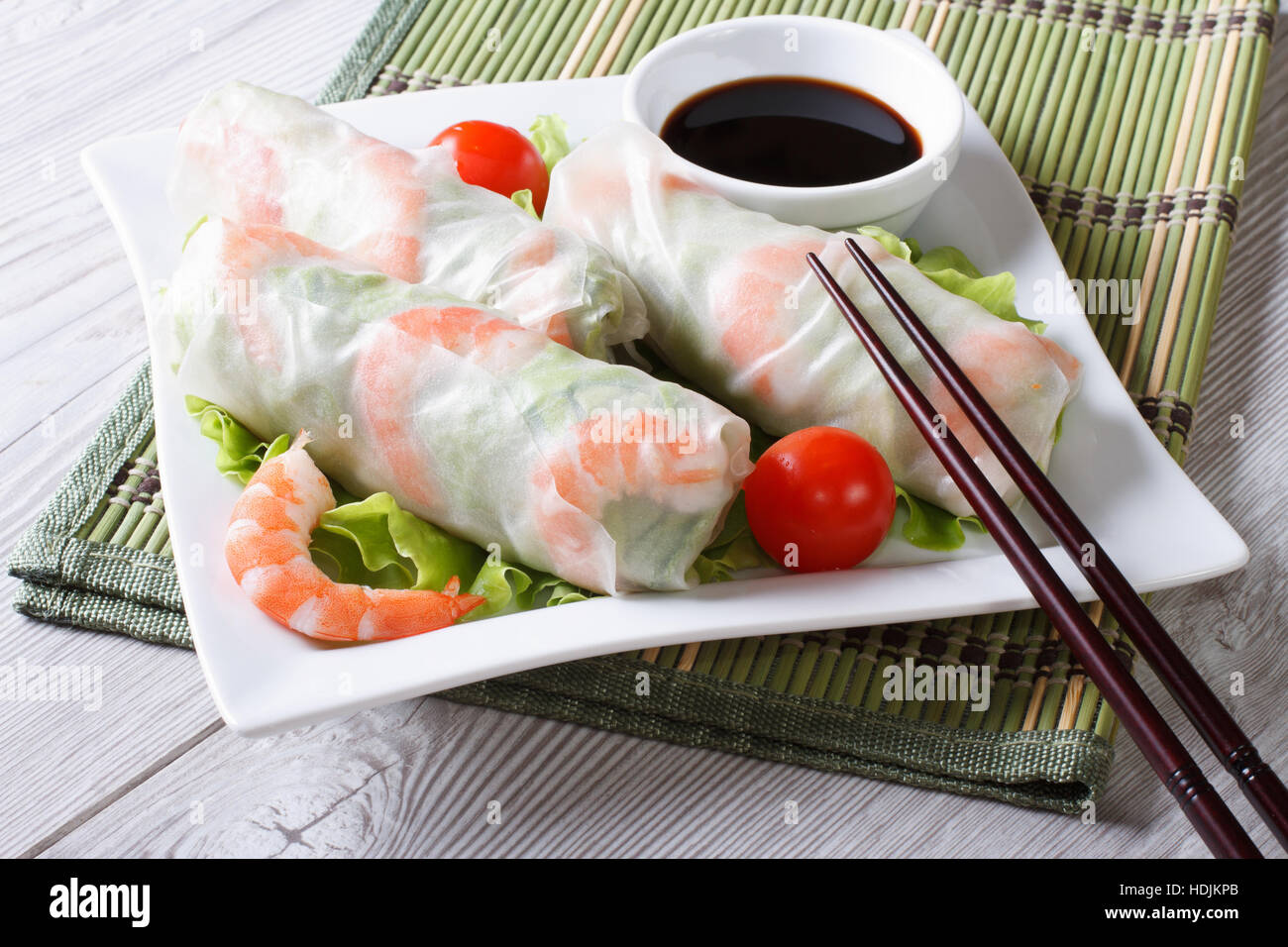spring roll with shrimp and sauce on a plate close-up. horizontal Stock ...