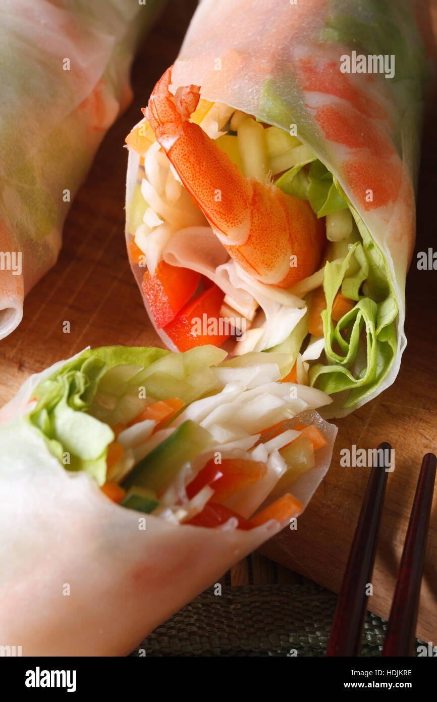 sliced Korean spring rolls with shrimp and vegetables macro. vertical ...