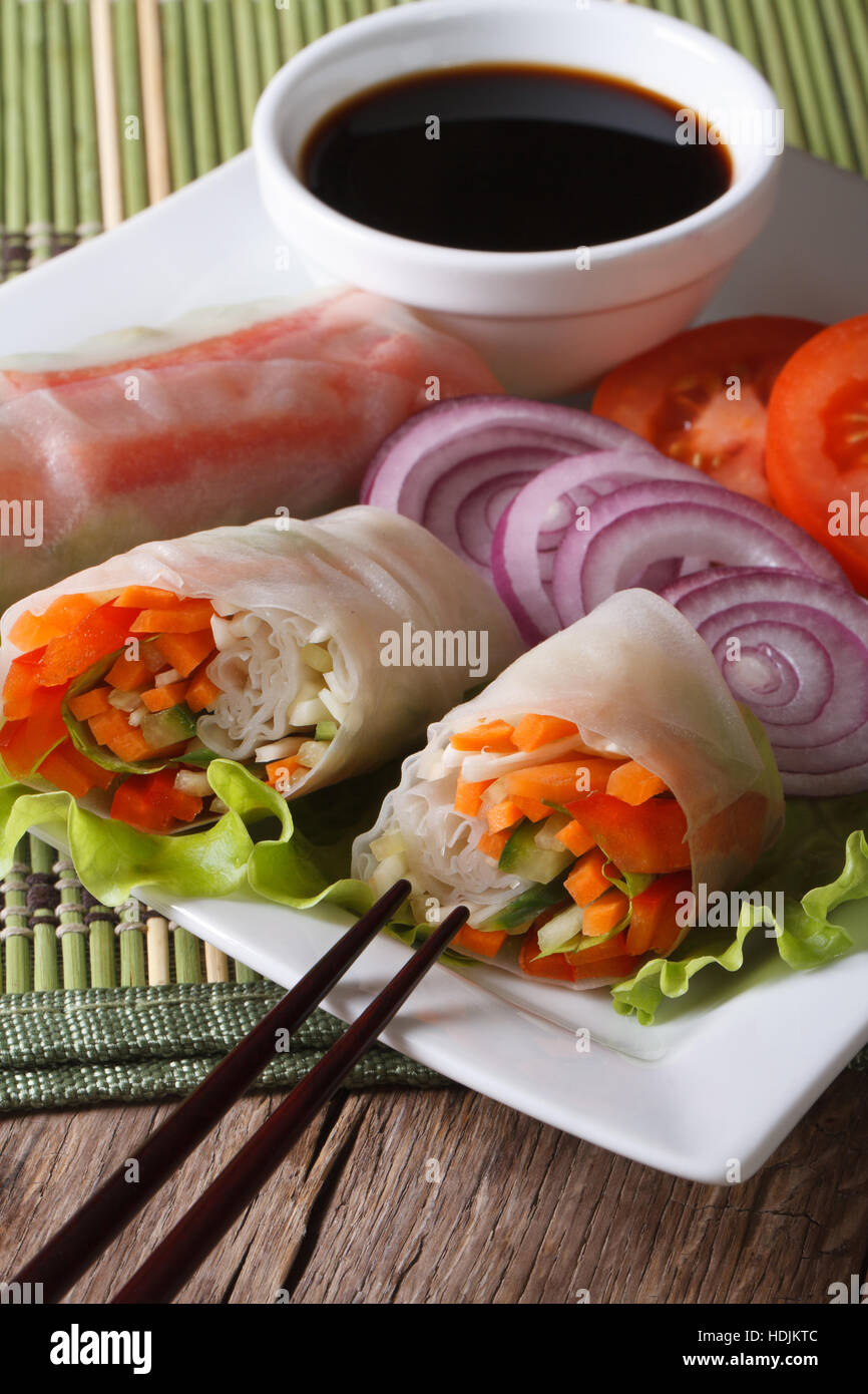 vegetarian vegetable spring rolls on a plate close-up. vertical Stock ...