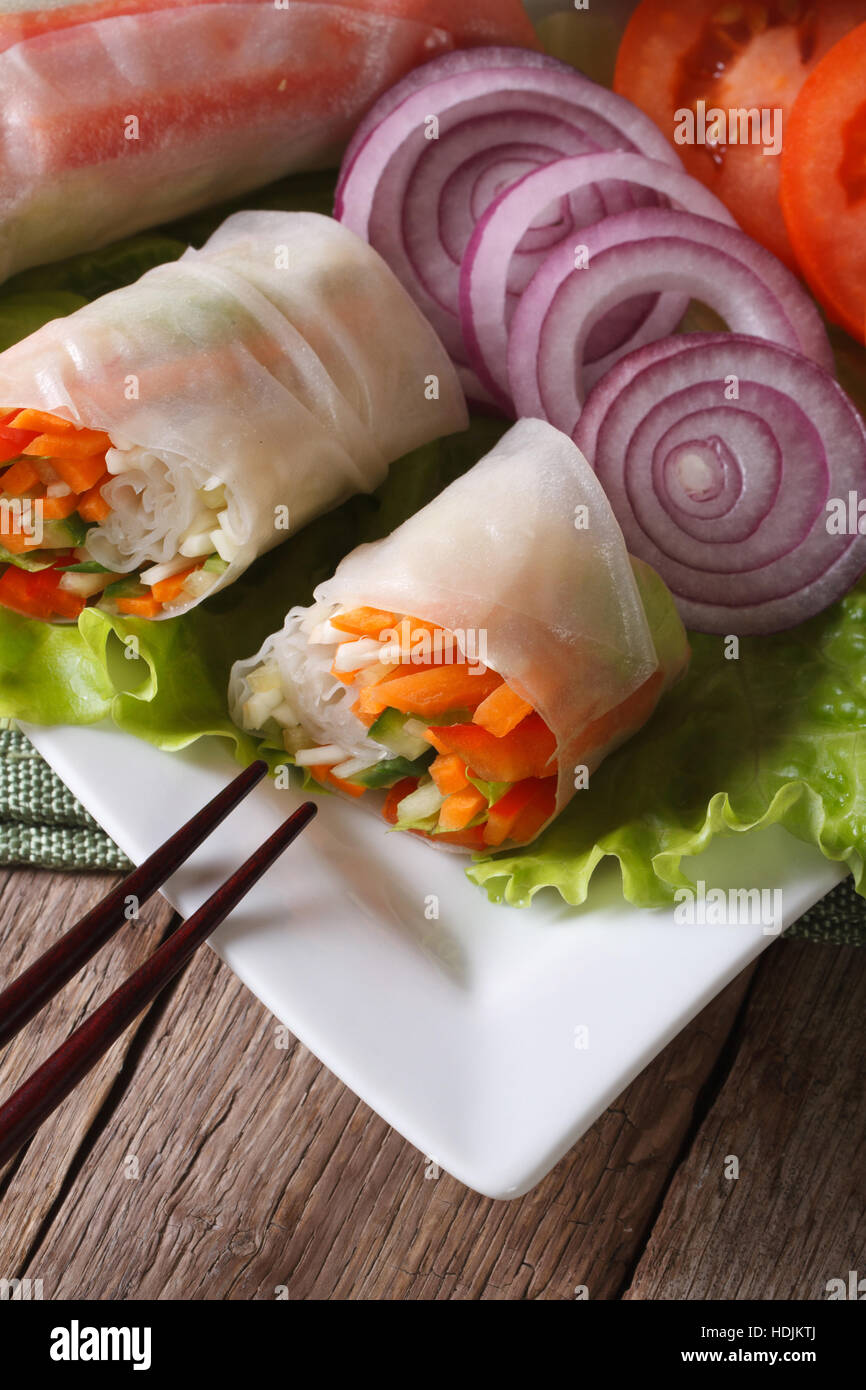 Vietnamese vegetable spring rolls with sauce on a plate close-up ...