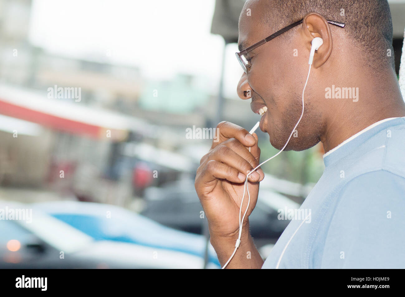 His communication is exciting, giving him a smile over the phone Stock ...