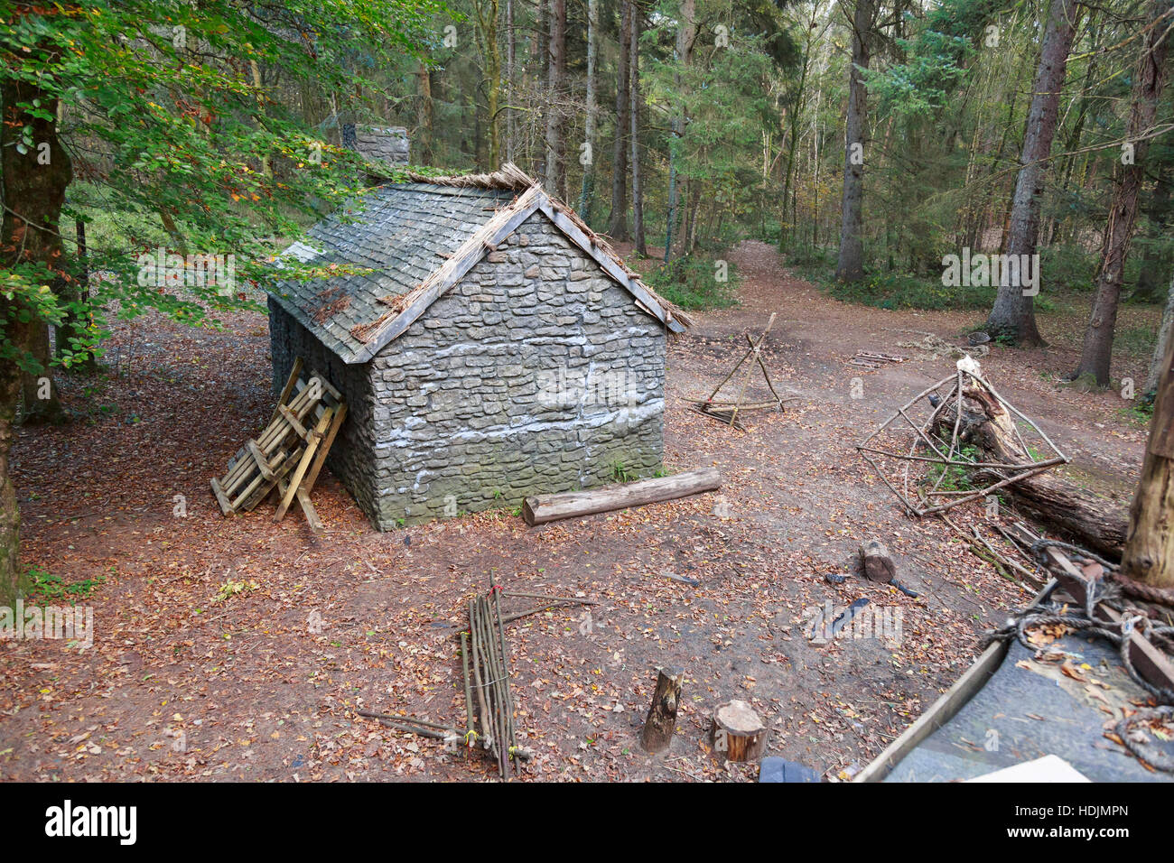 woodland film set with cottage and props Stock Photo - Alamy