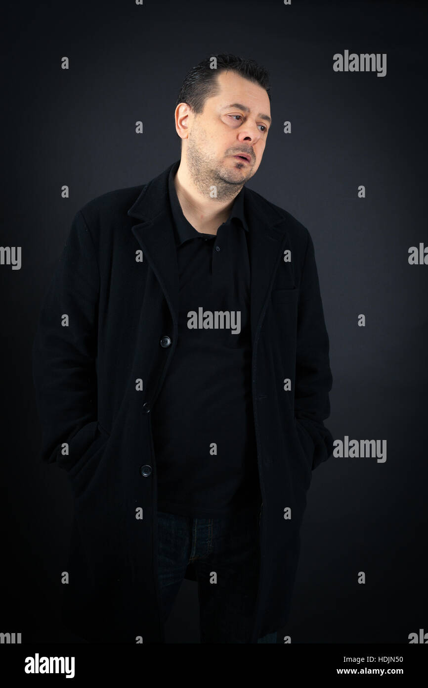 Handsome man doing different expressions in different sets of clothes ...