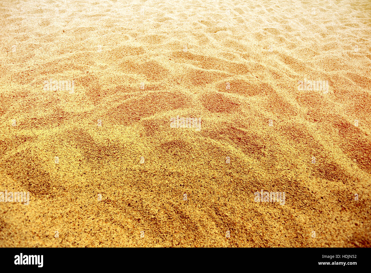 Photos bright yellow sand on the beach Stock Photo - Alamy