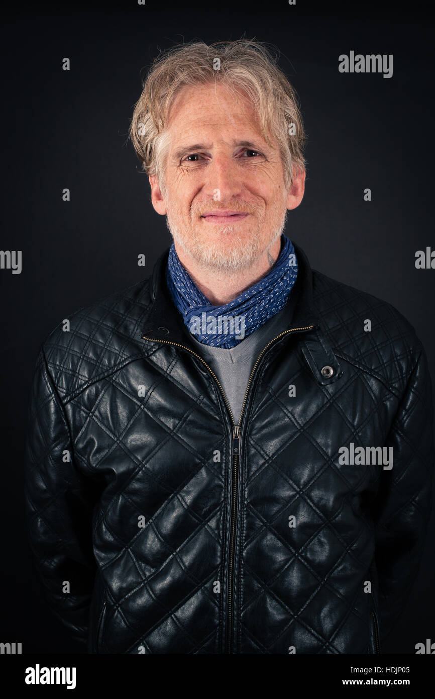 Handsome man doing different expressions in different sets of clothes ...