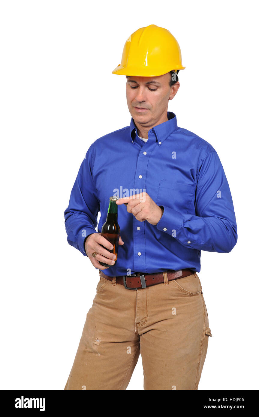 Handsome construction worker having an after work beer Stock Photo - Alamy