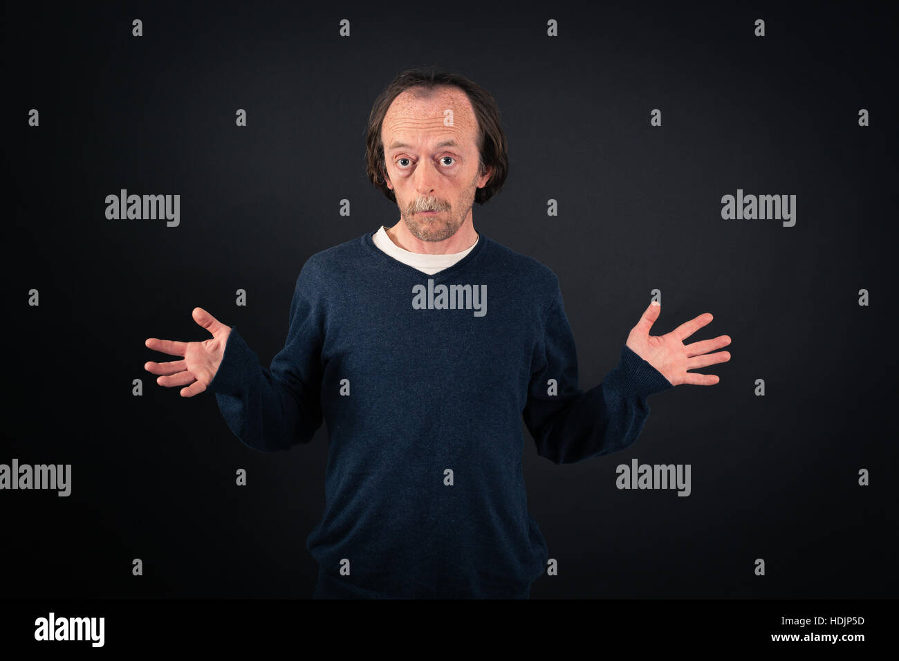 Handsome man doing different expressions in different sets of clothes ...