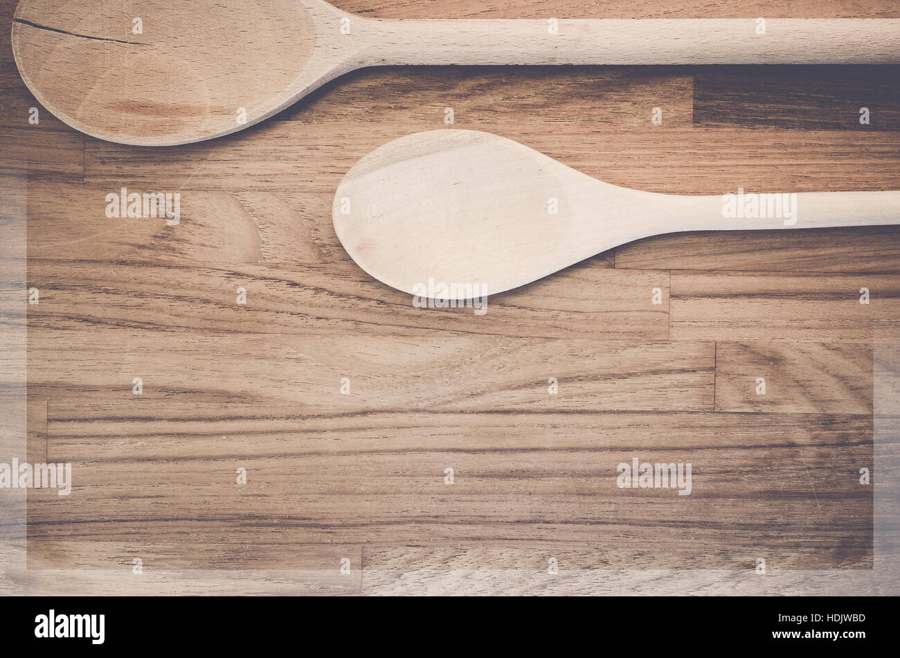 wooden spoons lined up on a wood tabletop Stock Photo - Alamy