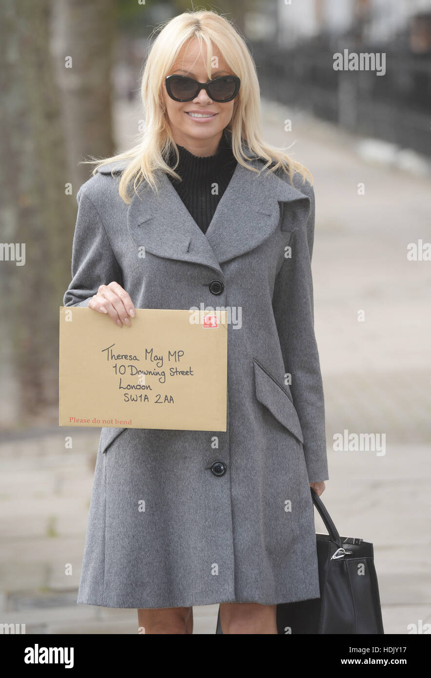 Pamela Anderson posts a letter urging Prime Minister Theresa May to ban ...