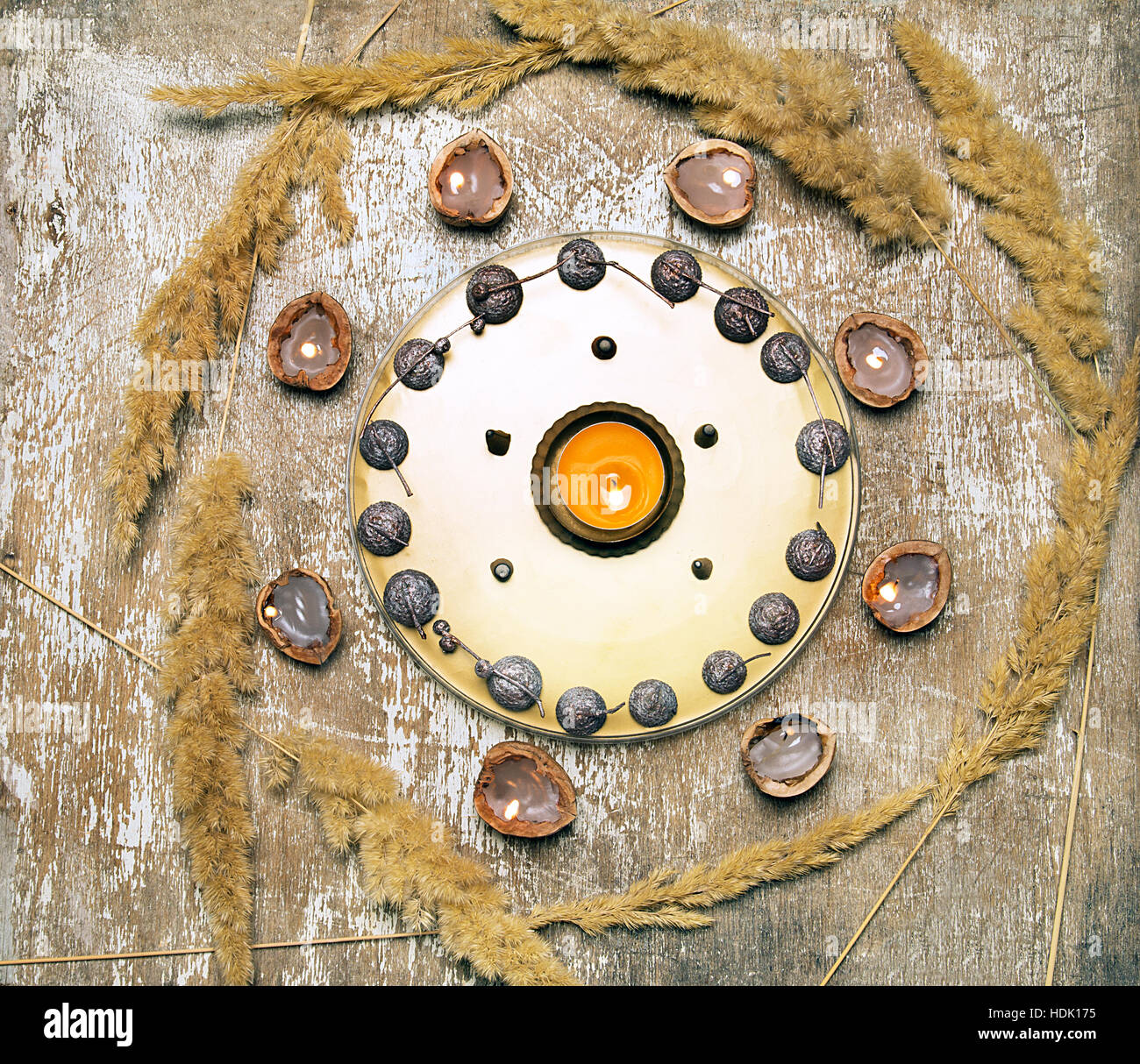Magical altar with candles and stones Stock Photo - Alamy