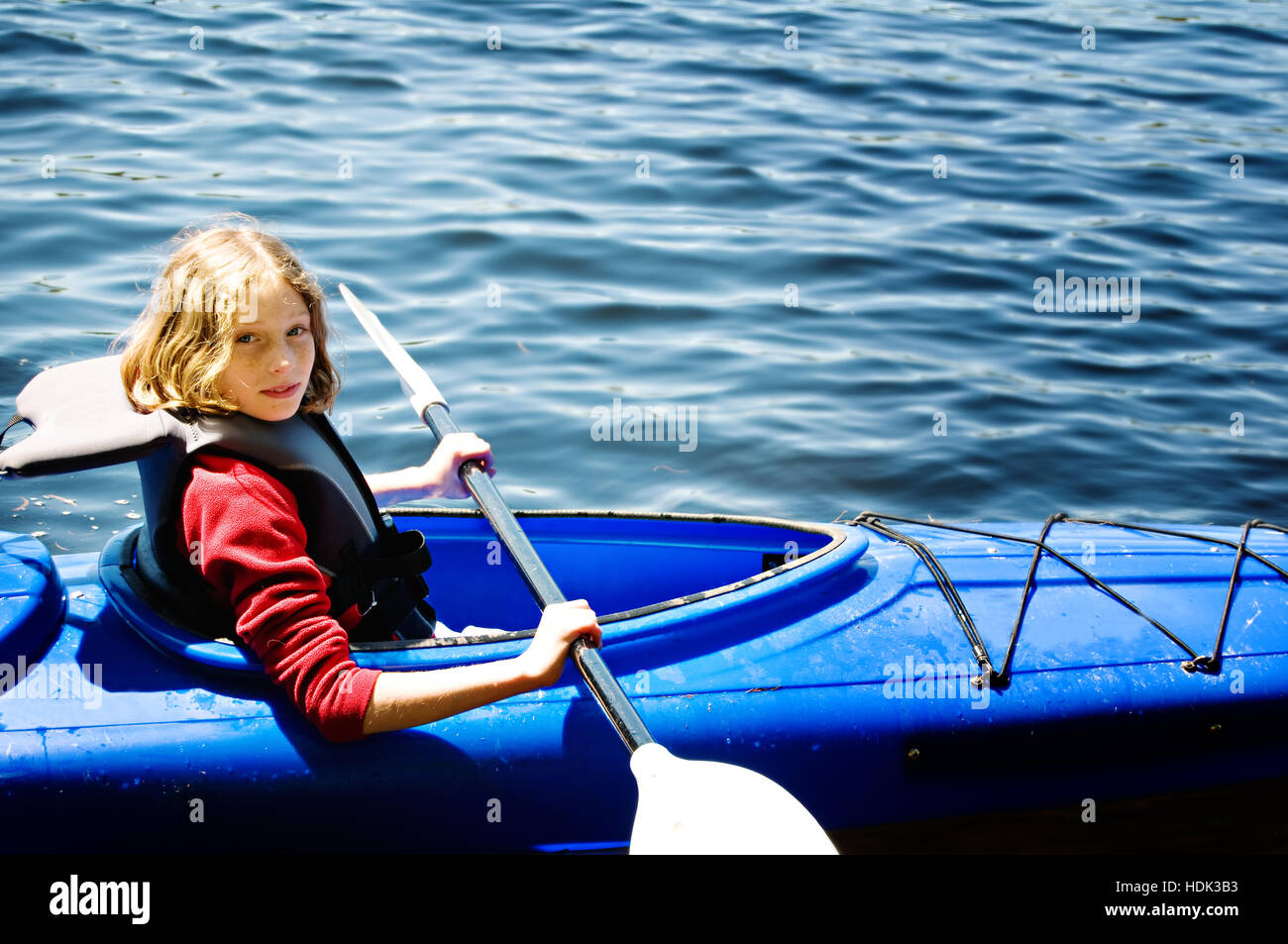 young girl in a kayak Stock Photo - Alamy