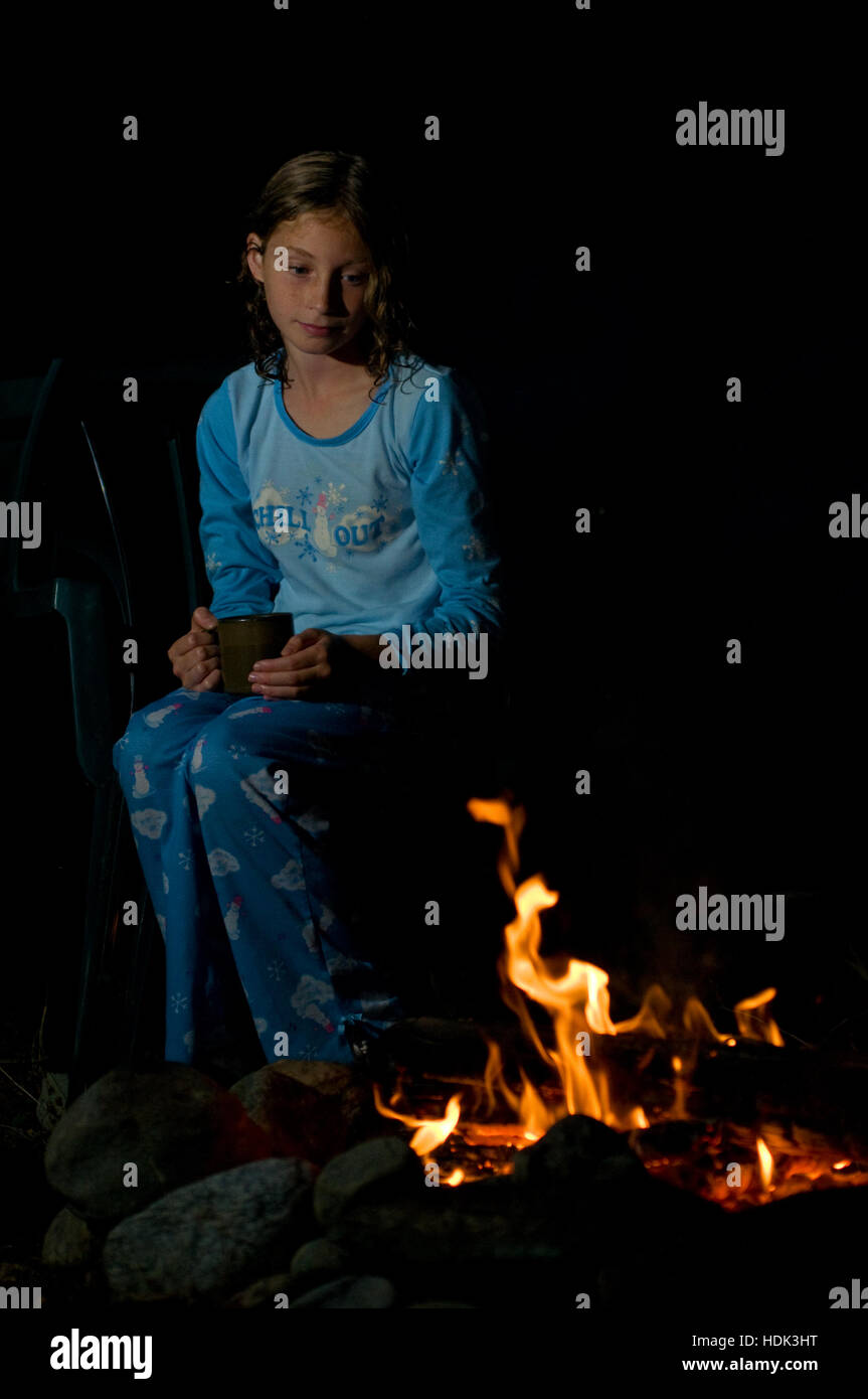 Sitting beside fire hi-res stock photography and images - Alamy