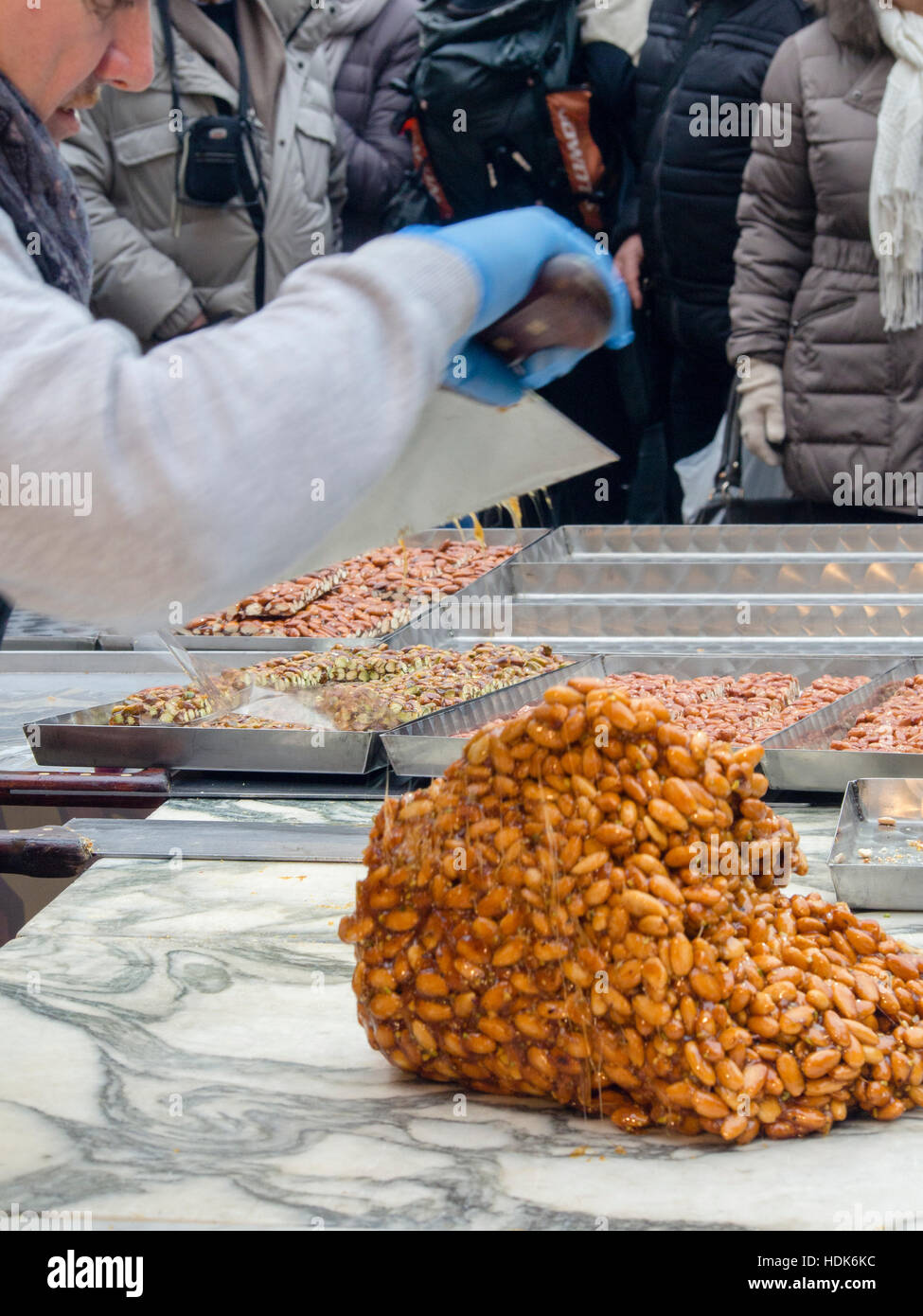 Making almond brittle , street live demo, Festa del Torrone, Cremona ...