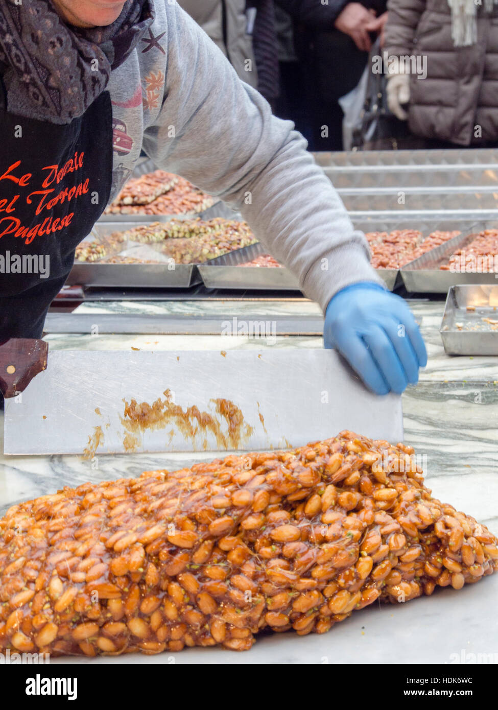 Making almond brittle , street live demo, Festa del Torrone, Cremona ...