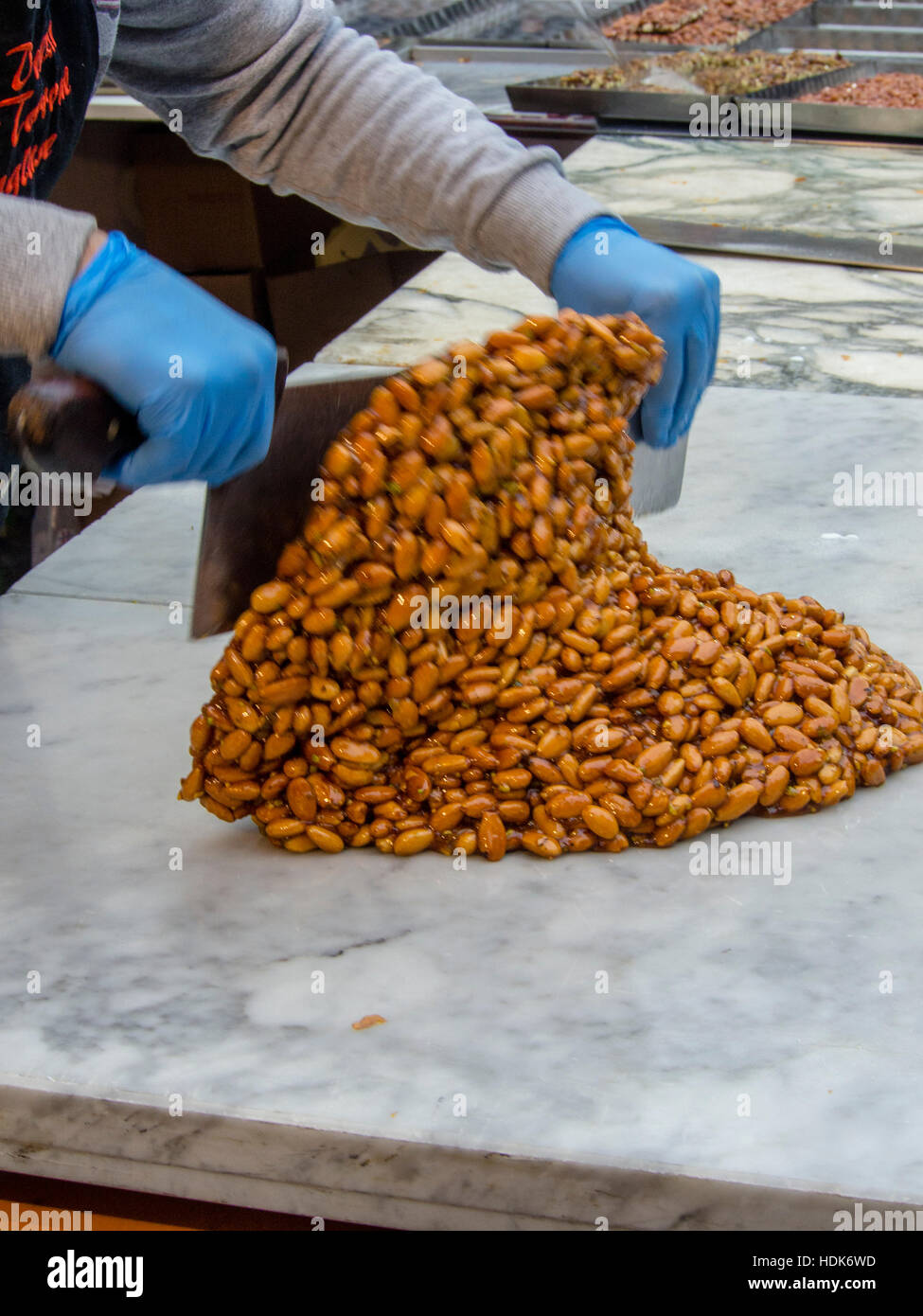 Making almond brittle , street live demo, Festa del Torrone, Cremona ...