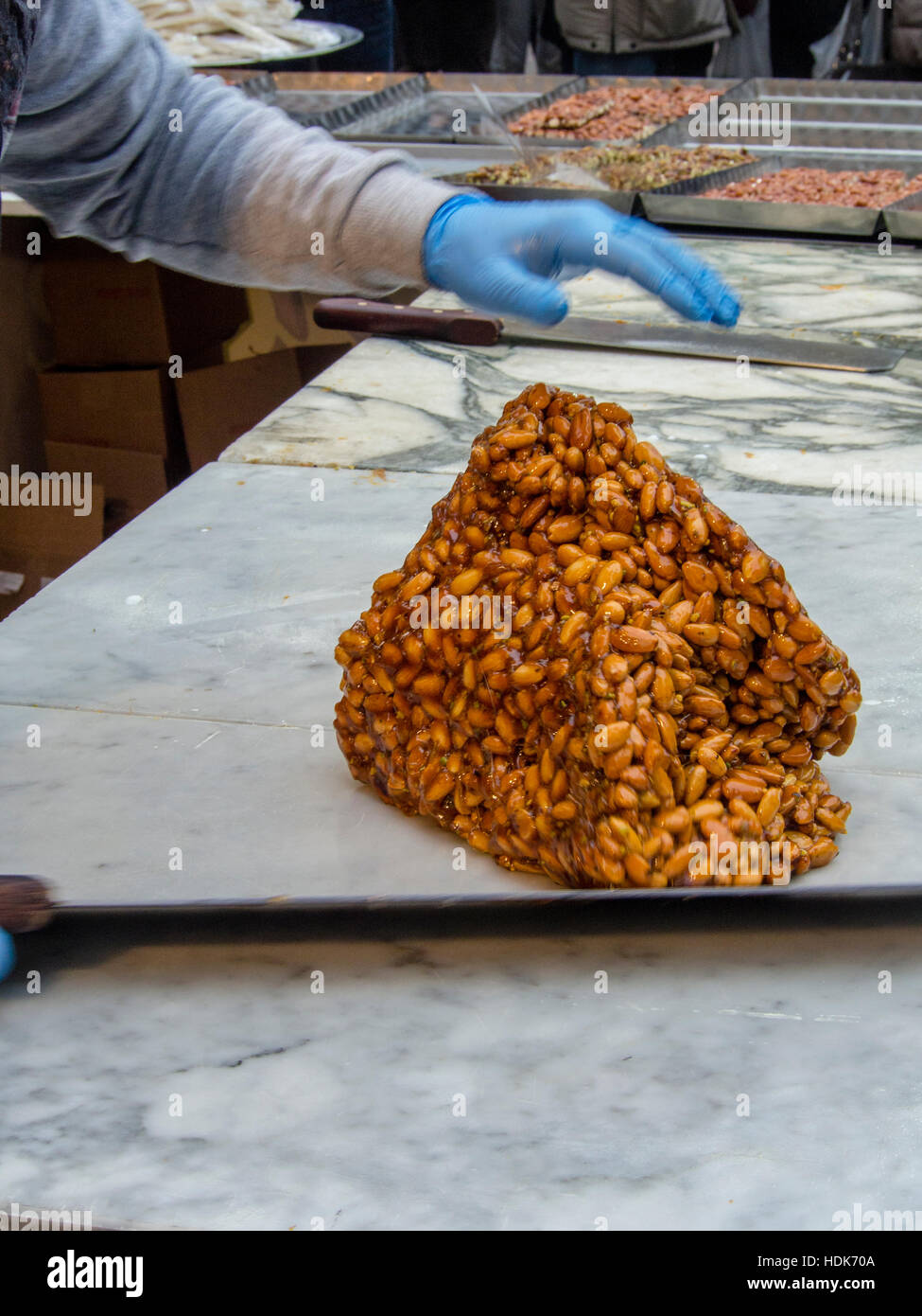 Making almond brittle , street live demo, Festa del Torrone, Cremona ...