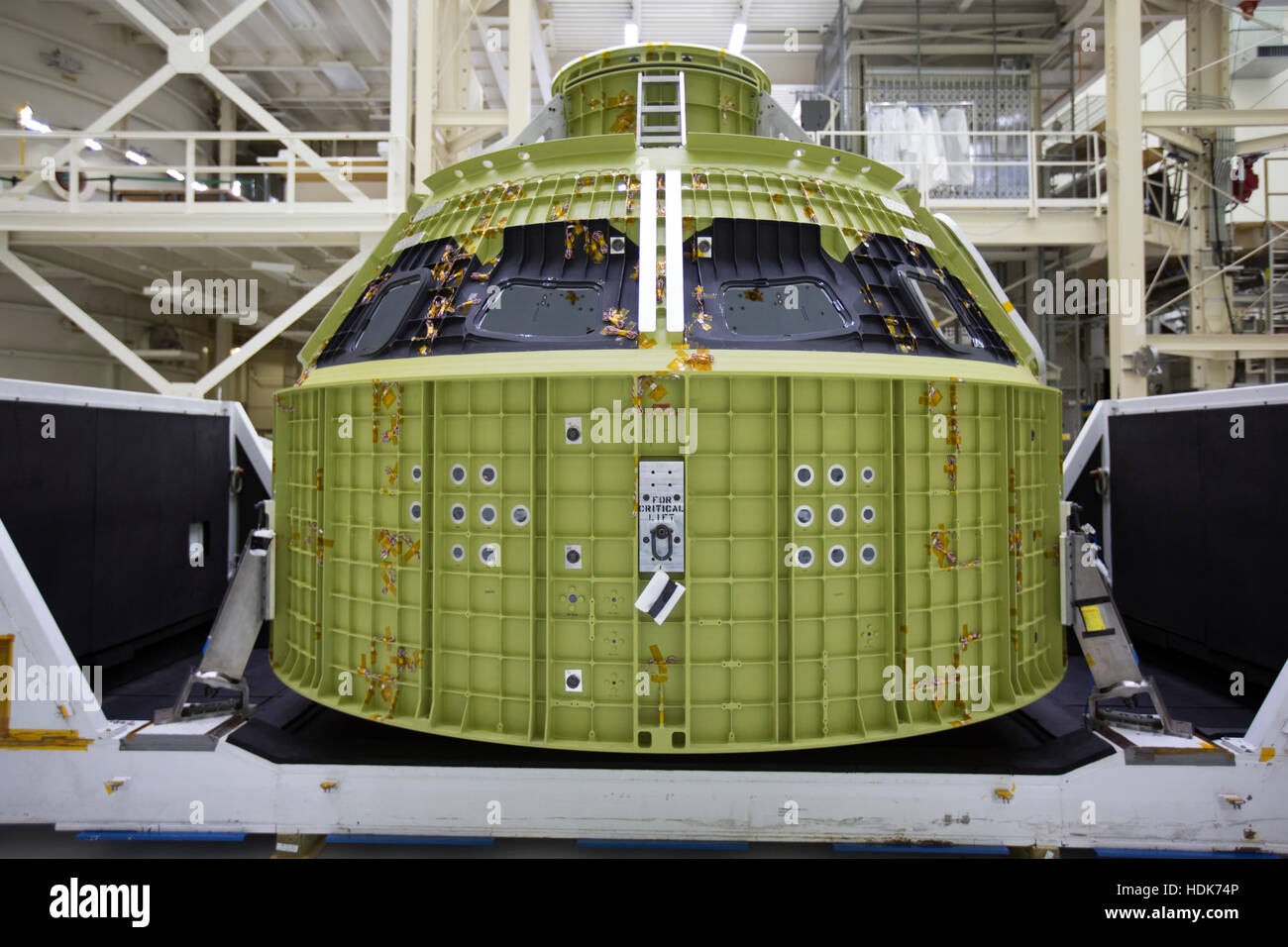 Lockheed Martin technicians remove the protective covering from the ...