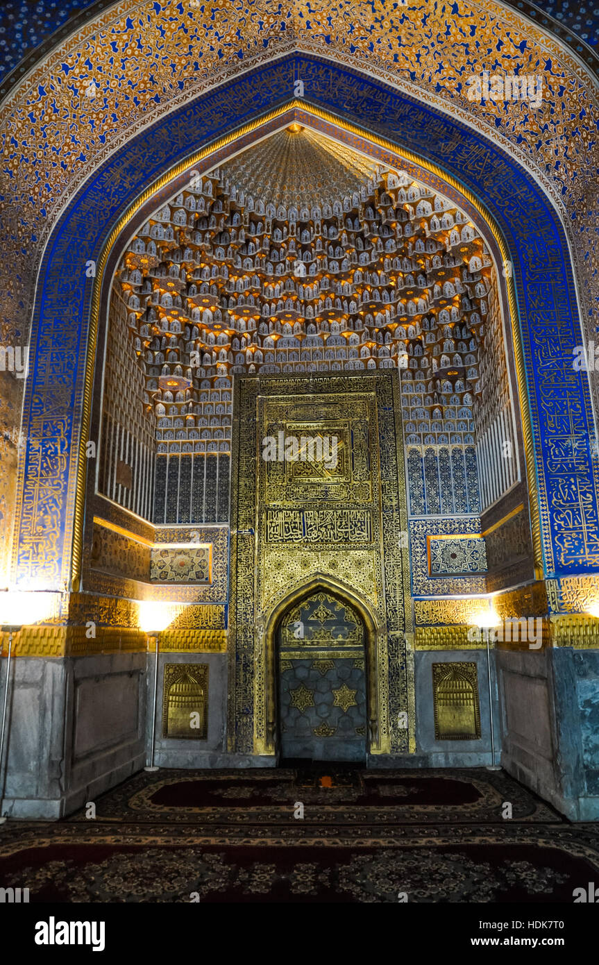 Photo of golden and colourful ornaments and patterns on inside walls of ...