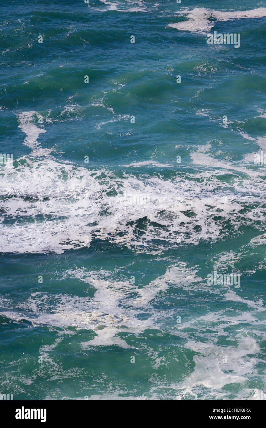 section of ocean with a variety of shades of blue and turquoise with ...