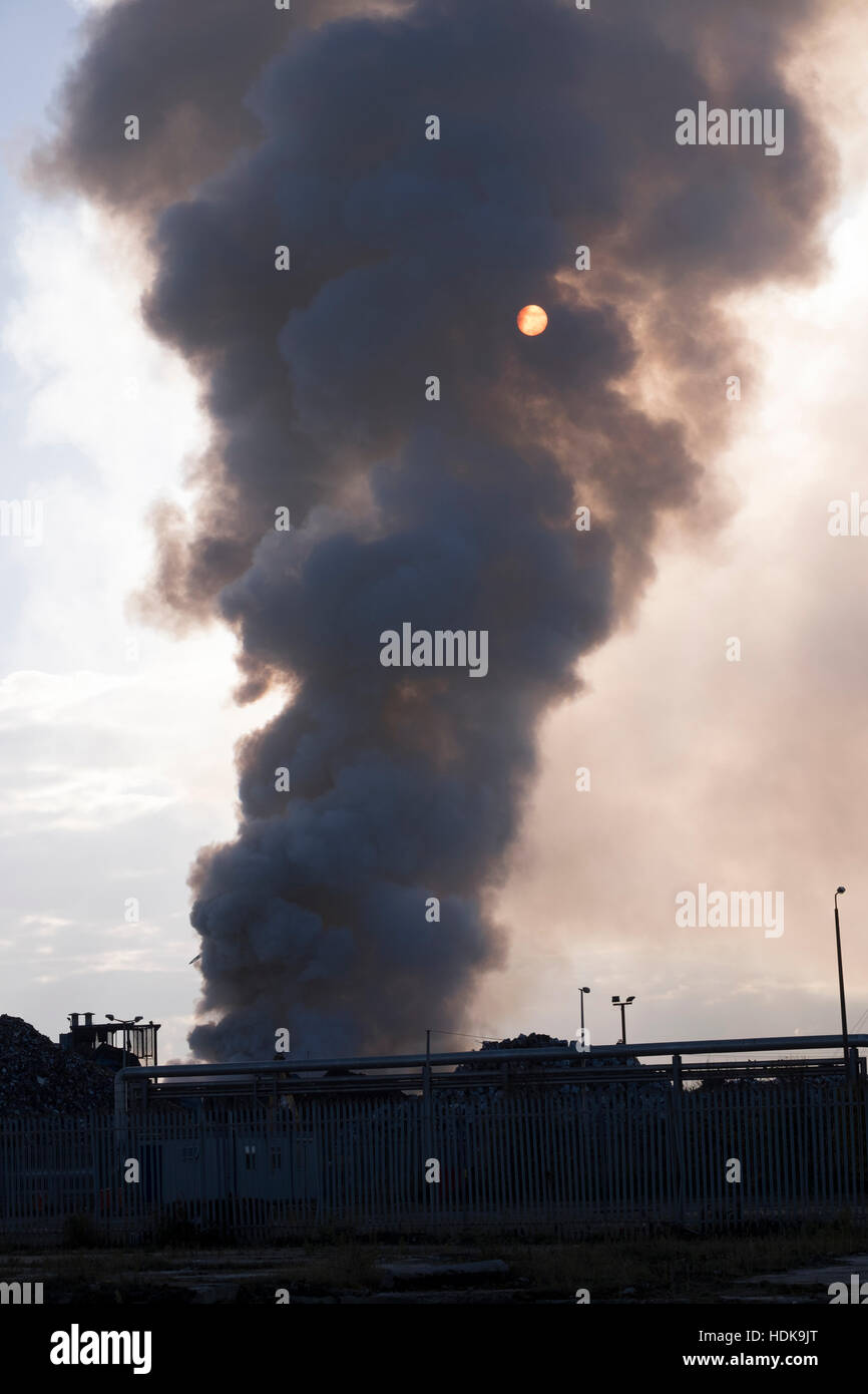 Fire, smoke, and sun Stock Photo - Alamy