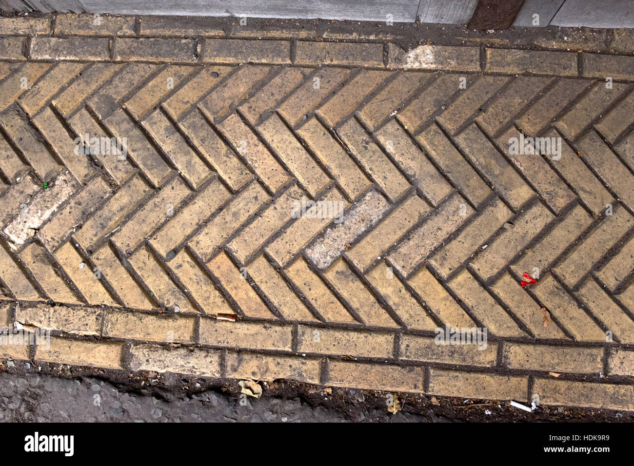 Herringbone pattern pavement sidewalk bricks Stock Photo - Alamy