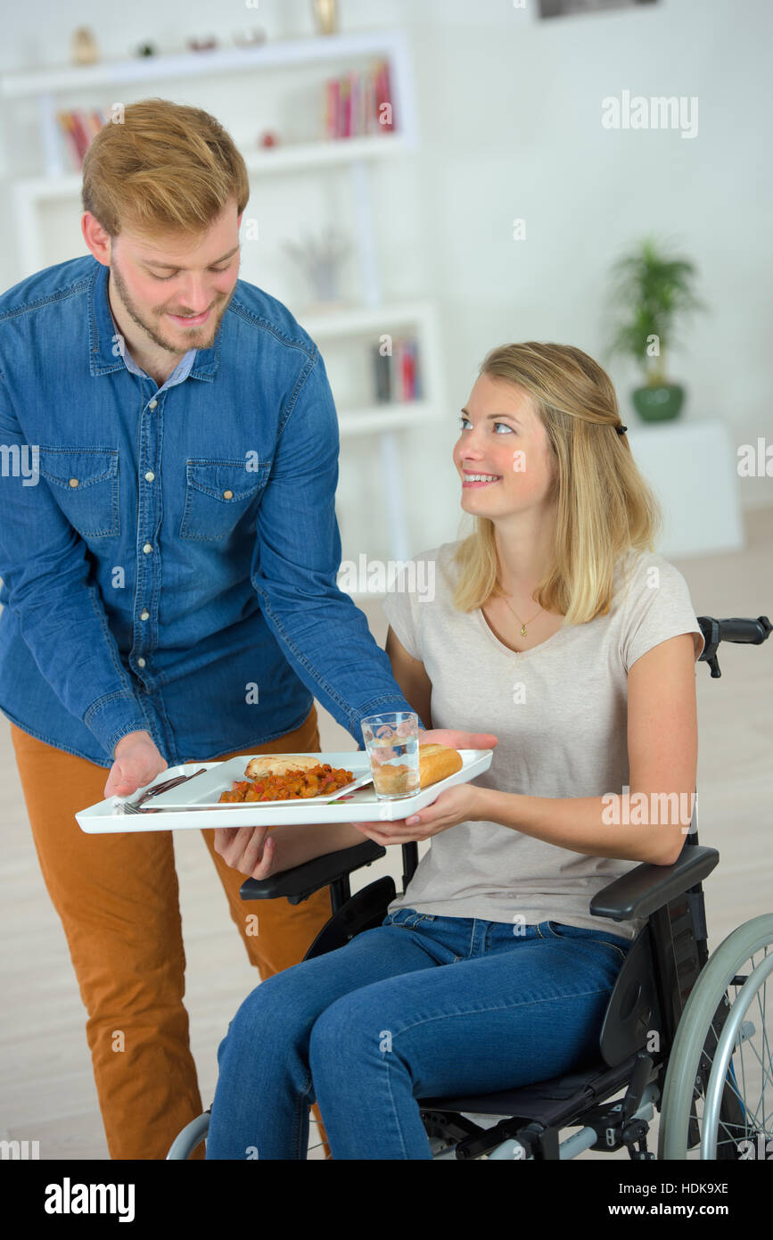 Girl bringing food hi-res stock photography and images - Alamy