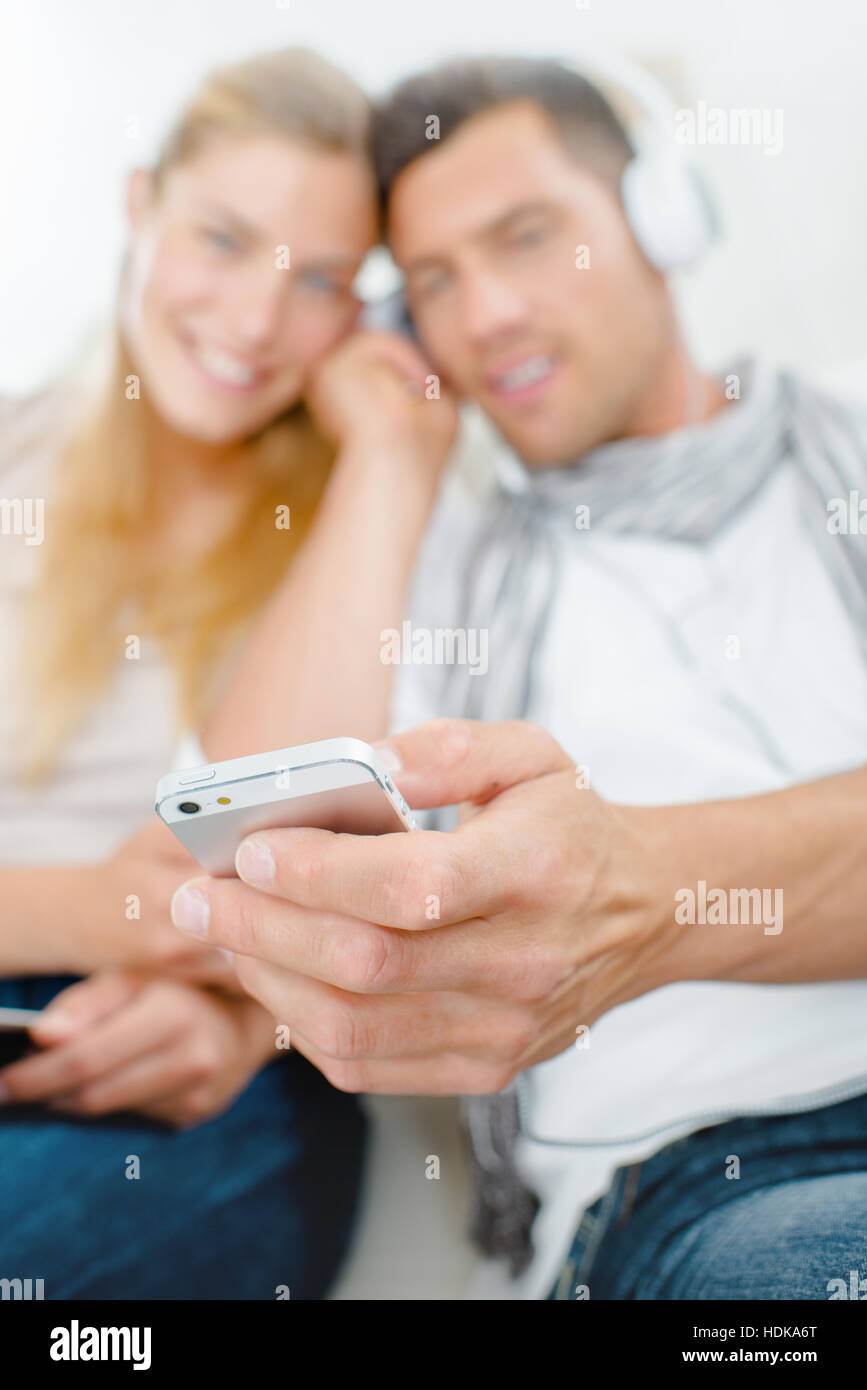 sharing the music Stock Photo - Alamy