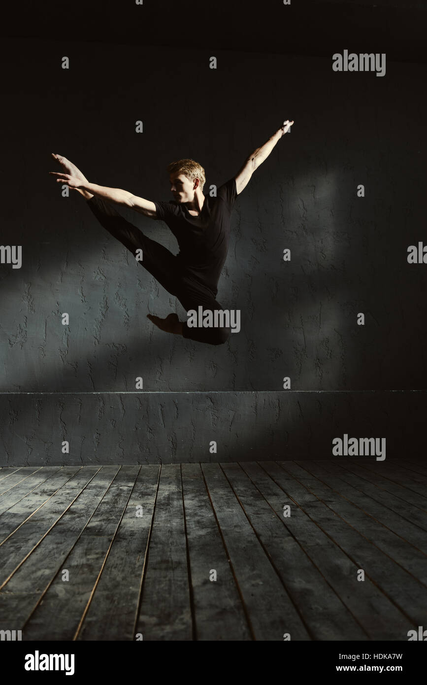 Skilled dancer showing his abilities in the studio Stock Photo - Alamy