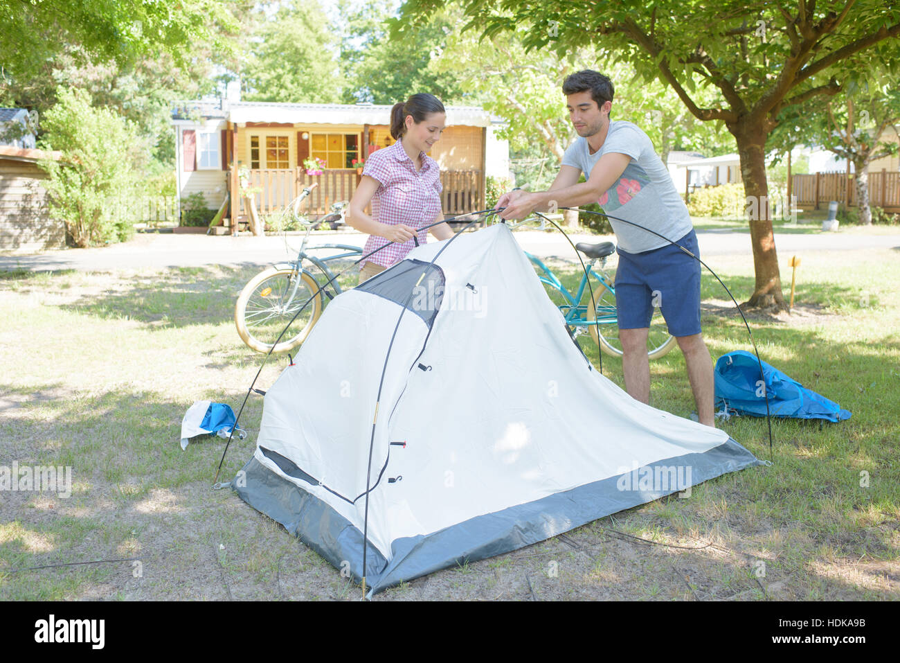 fixing a tent Stock Photo - Alamy