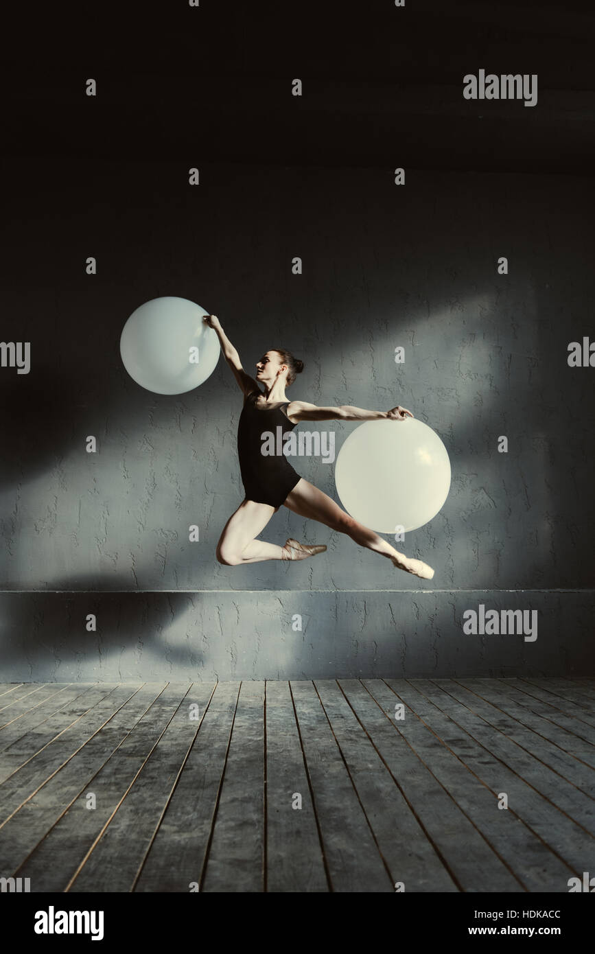 Inspired ballet dancer demonstrating her flexibility Stock Photo - Alamy