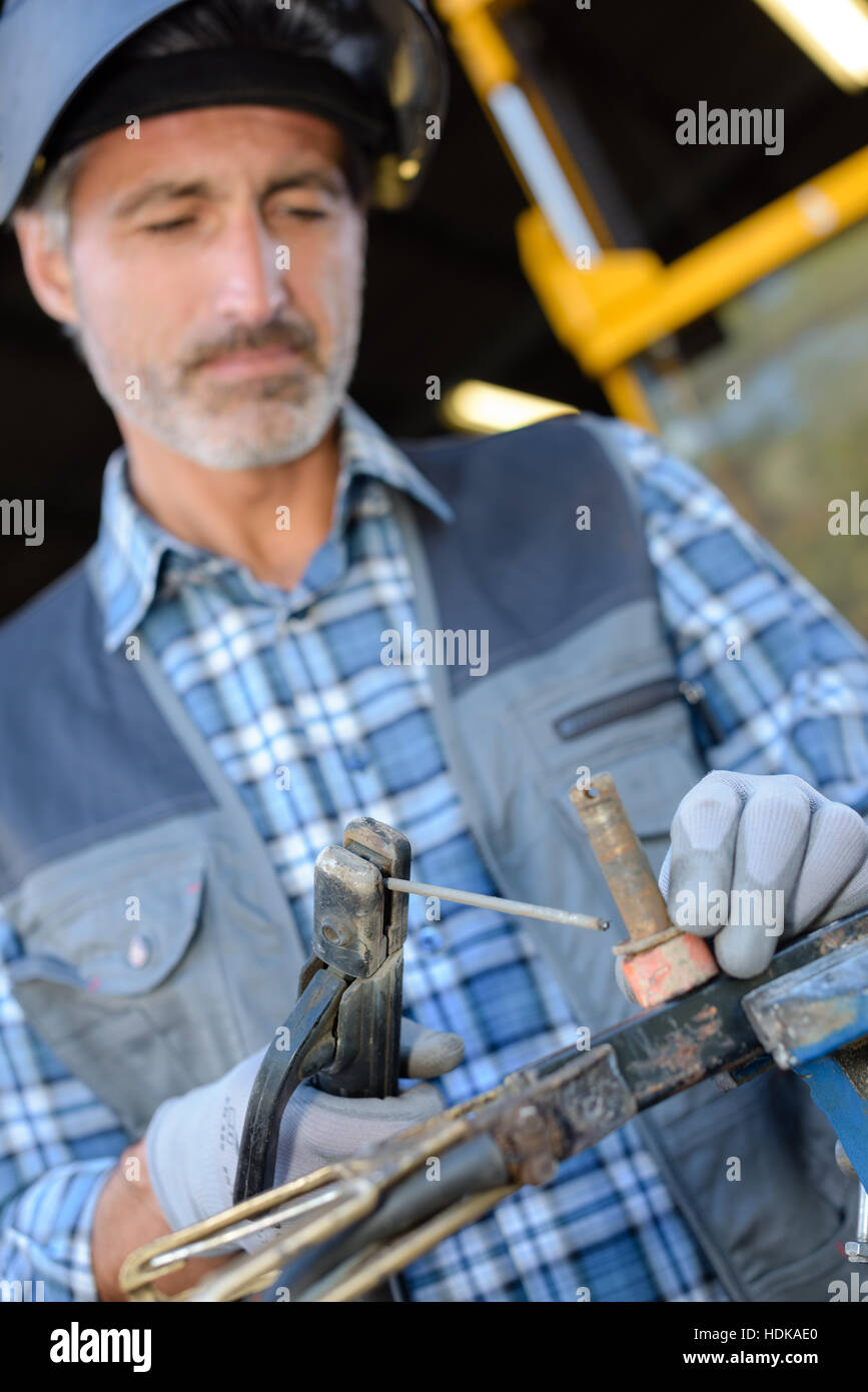 fixing a rod Stock Photo - Alamy
