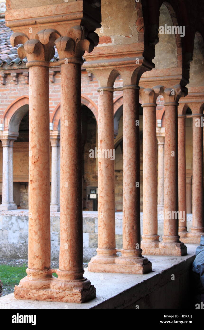 Columns and arches in the medieval cloister of Saint Zeno. Verona ...