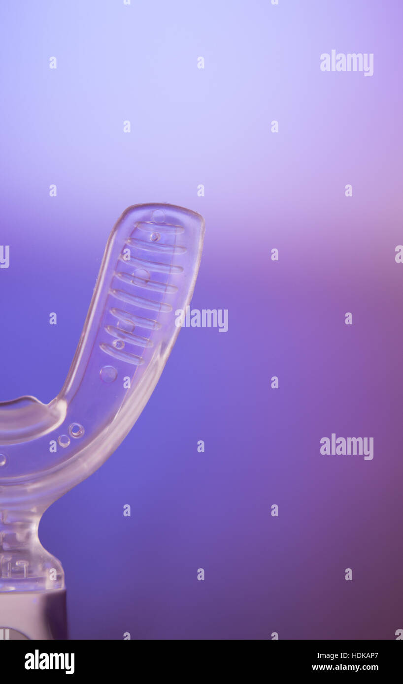 Vibrating dental device with invisible orthodontics Stock Photo - Alamy