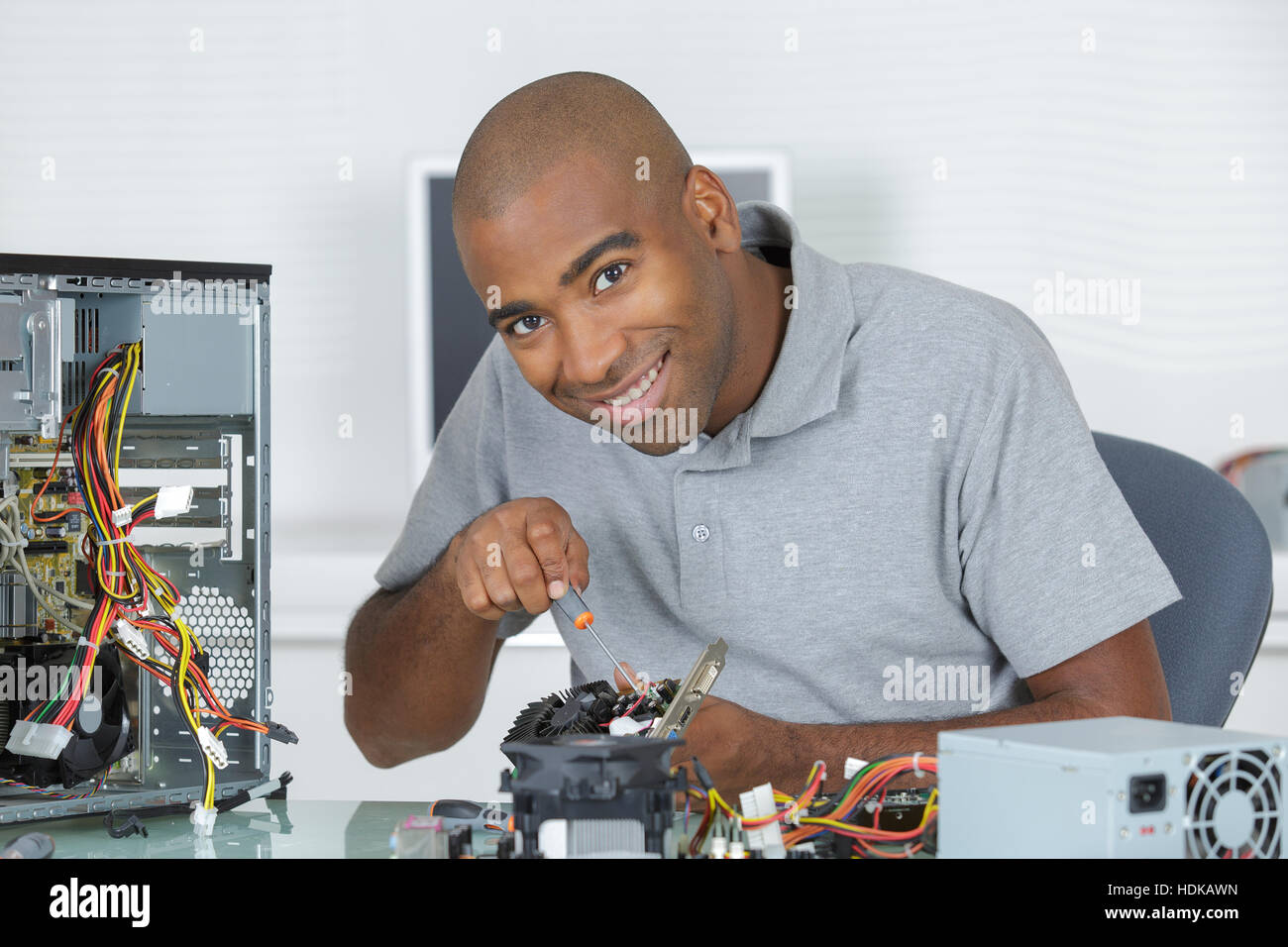 man fixing a motherboard Stock Photo - Alamy