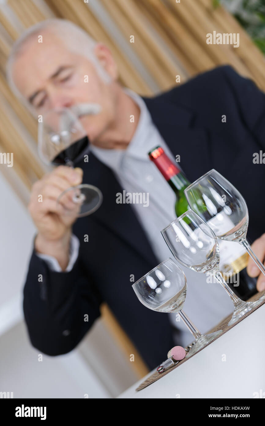 senior man tasting wine thinking deeply on life Stock Photo - Alamy