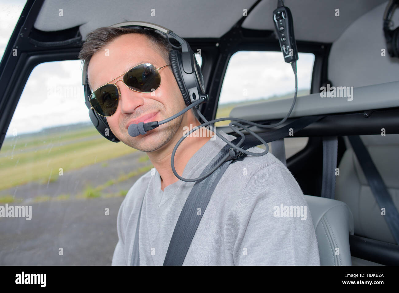 Pilot wearing headset microphone hi-res stock photography and images ...