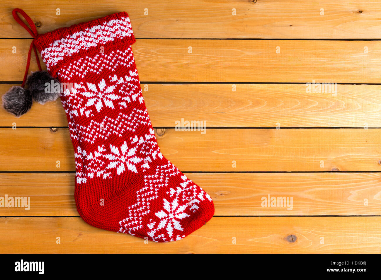 Single red color empty woollen Christmas stocking waiting for Christmas ...