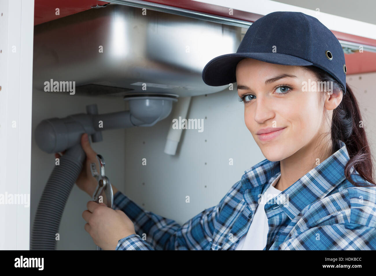 a woman plumber Stock Photo - Alamy