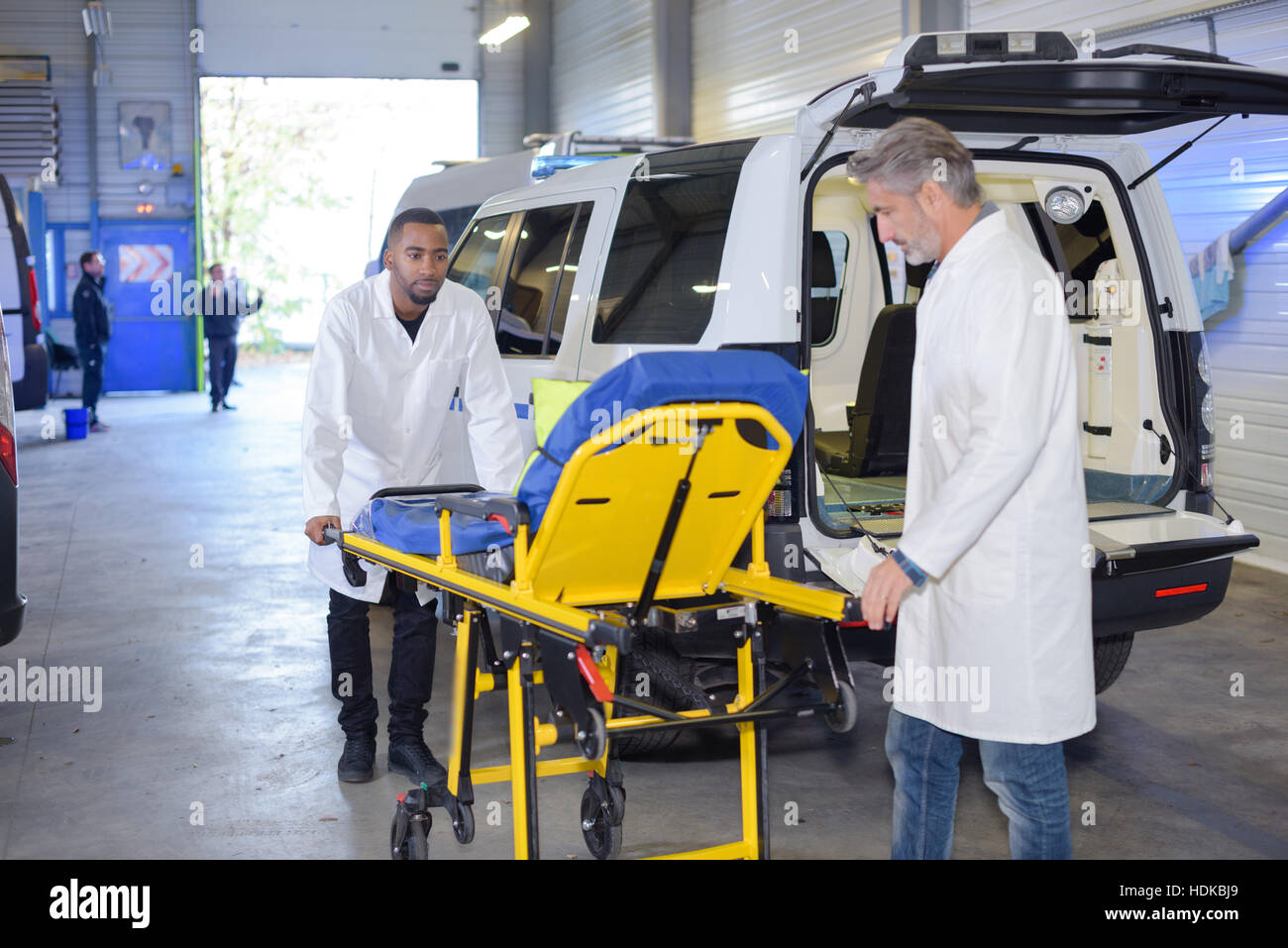 emergency assistance worker Stock Photo - Alamy