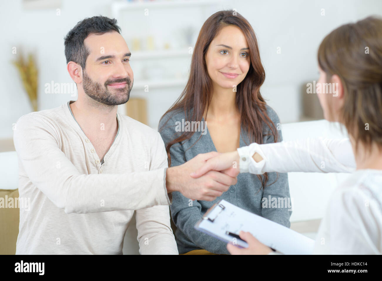 young happy couple after therapy session with psychologist Stock Photo ...