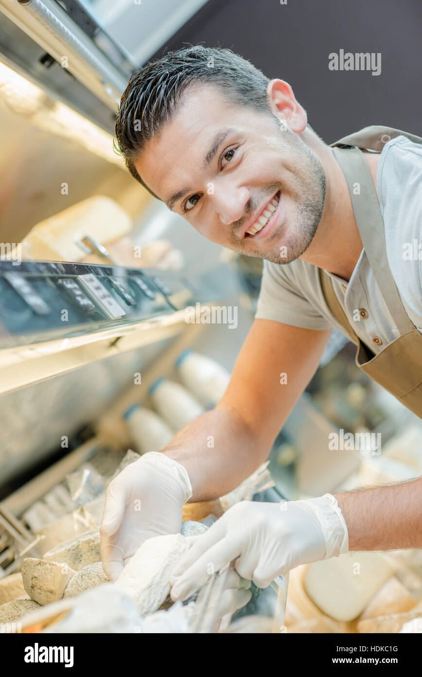 man putting cheese Stock Photo - Alamy