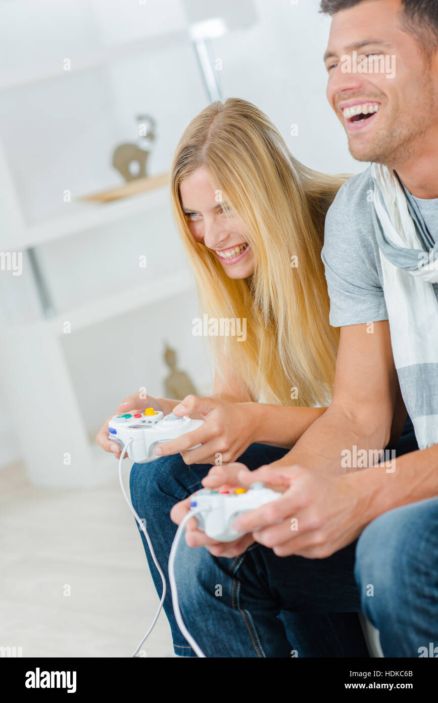 Couple playing video games Stock Photo - Alamy