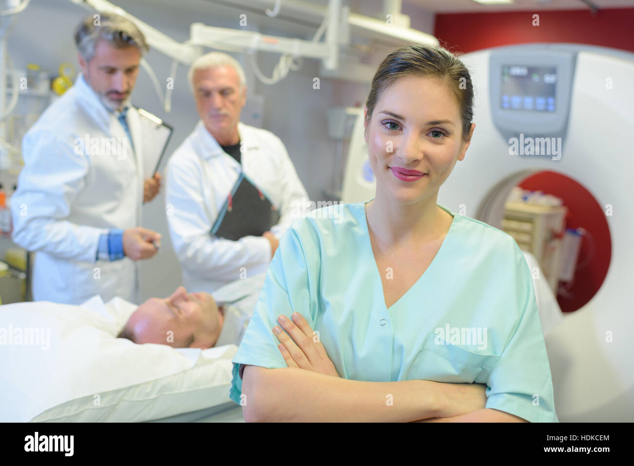 Portrait of nurse in front of mri scanner Stock Photo - Alamy